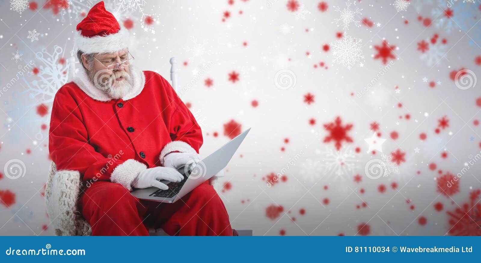 Composite Image of Serious Santa Claus Using Laptop Stock Photo - Image ...
