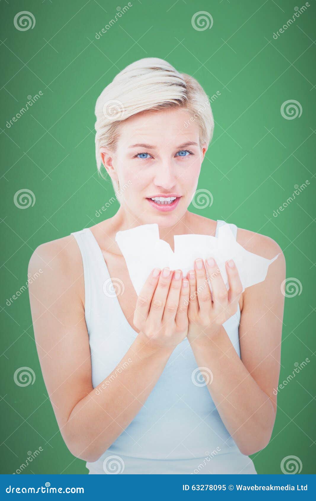 Composite Image of Sick Woman Holding Tissues Looking at Camera Stock ...