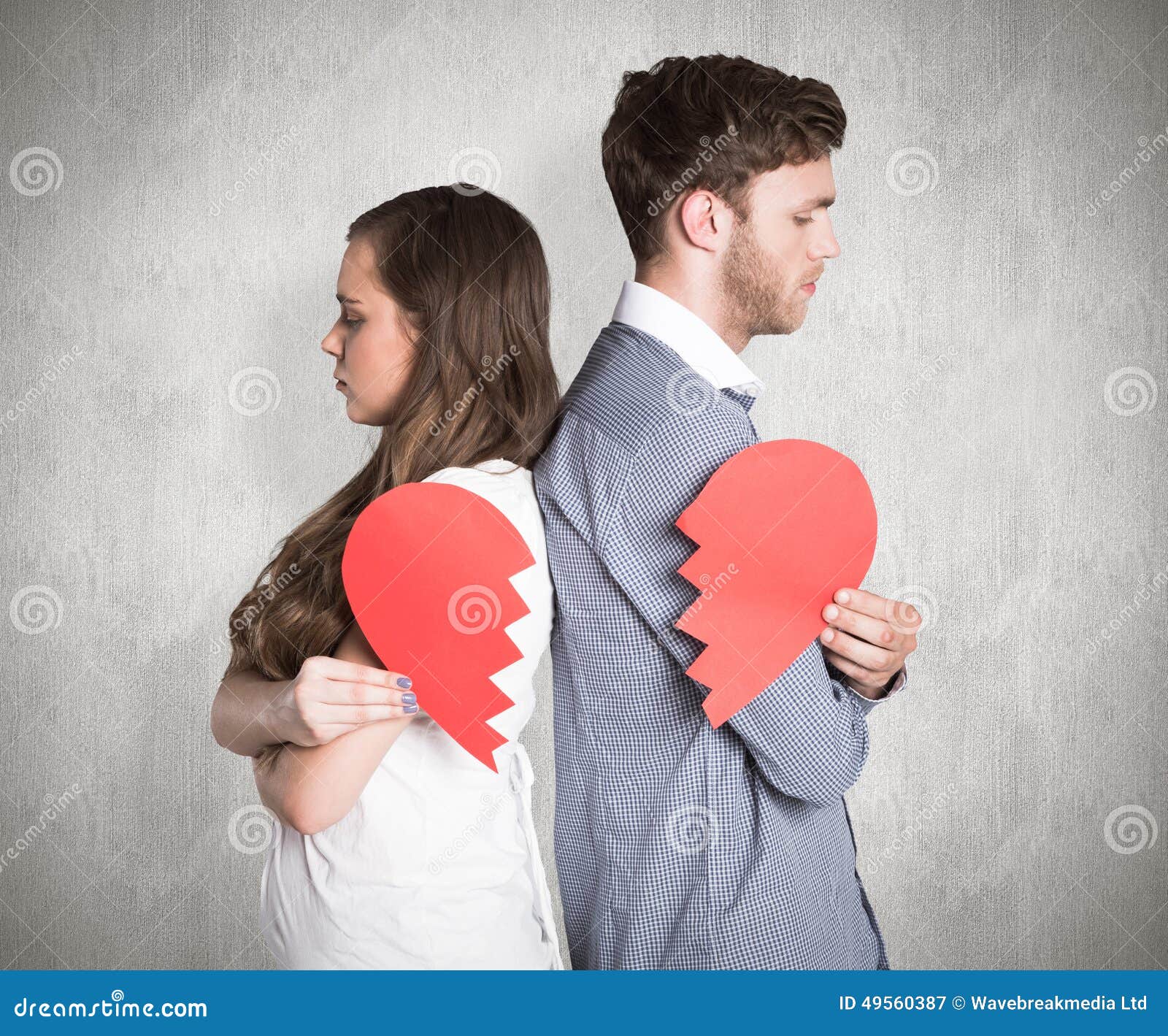 Composite Image of Side View of Young Couple Holding Broken Heart Stock ...