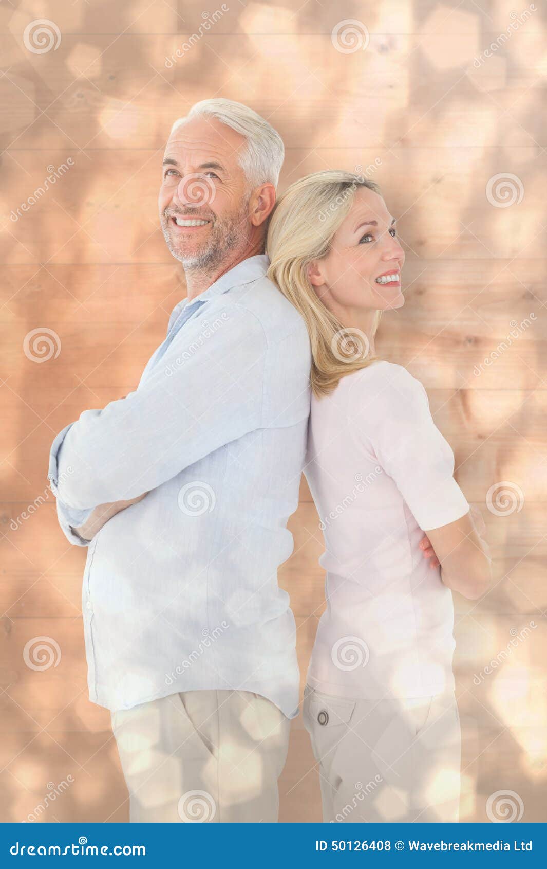 Composite Image of Smiling Couple Standing Leaning Backs Together Stock ...