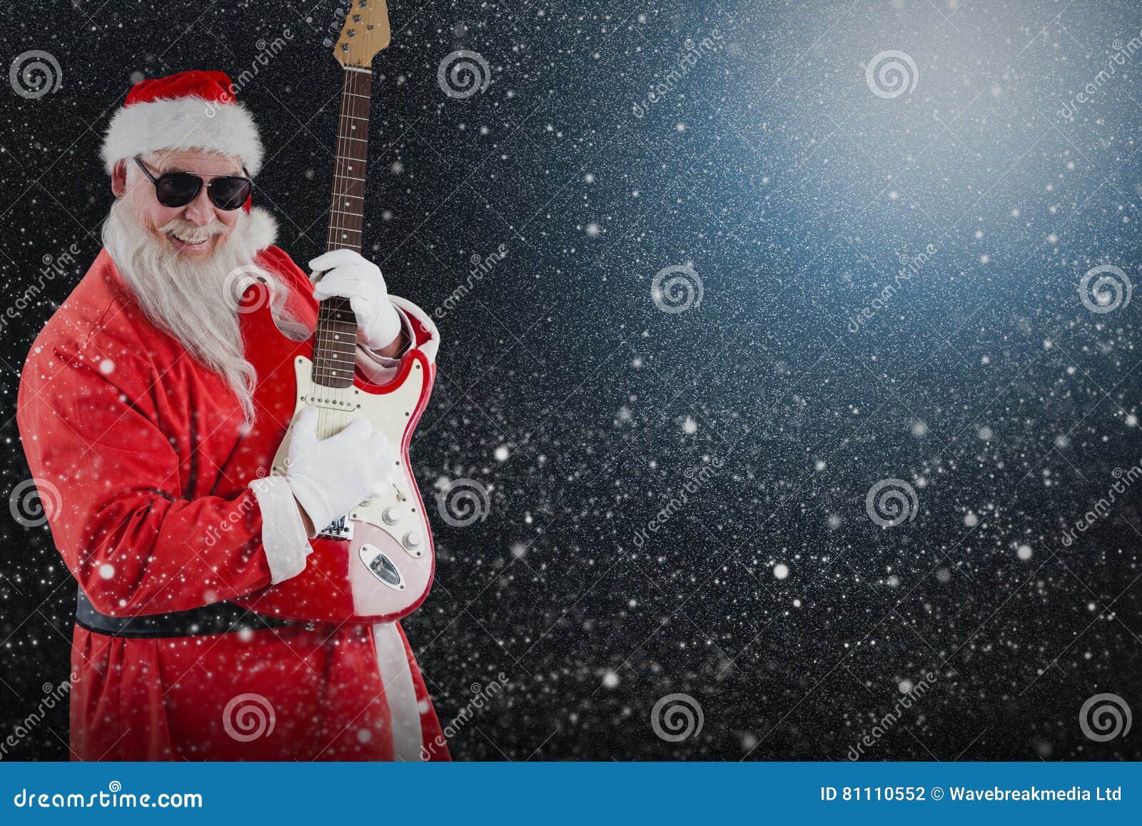 Composite Image of Smiling Santa Claus Playing a Guitar Stock Photo ...