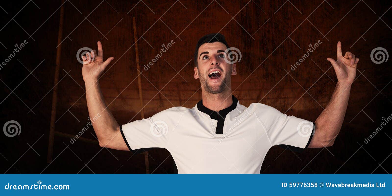 Composite Image of Surprised Rugby Player Pointing Up Stock Photo ...