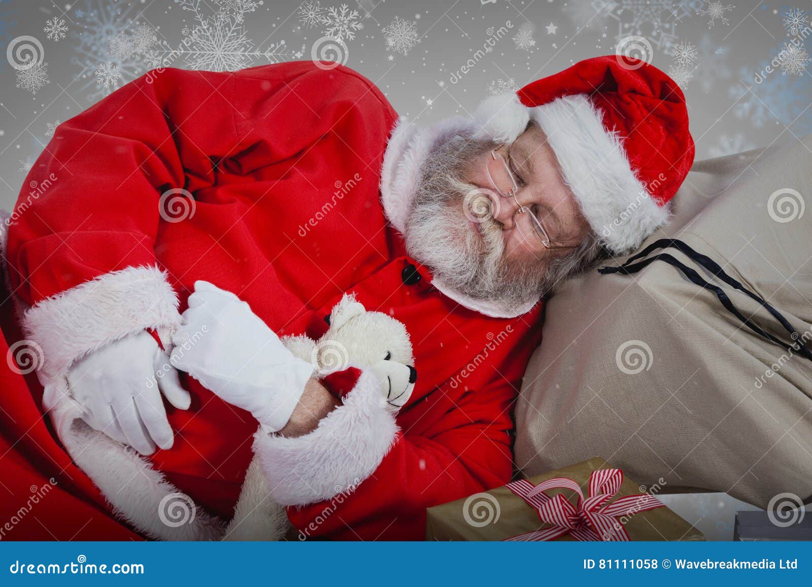 Composite Image of Tired Santa Claus Sleeping beside Christmas Presents ...