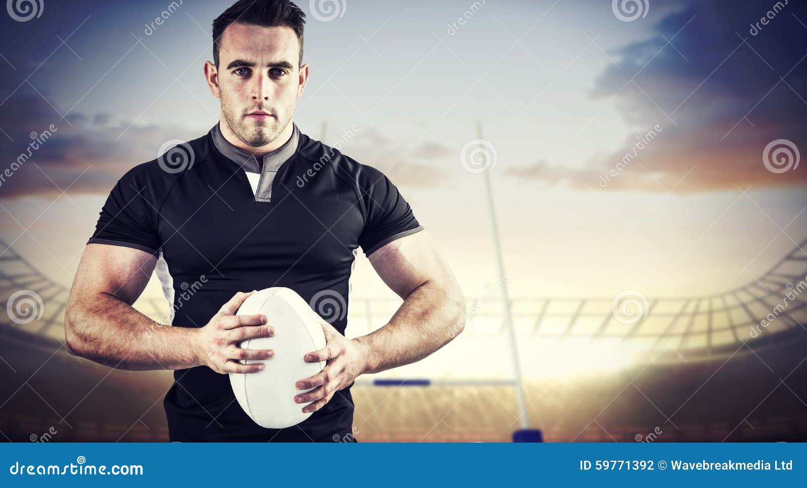 Composite Image of Tough Rugby Player Looking at Camera Stock Photo ...