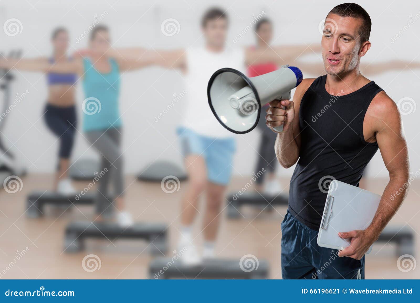 Composite Image of Trainer Using Megaphone while Holding Clipboard ...