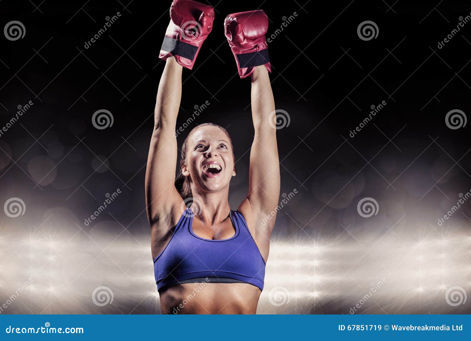 Composite Image of Winning Fighter with Arms Raised Stock Image - Image ...