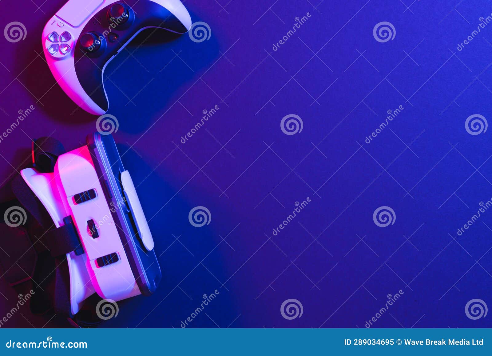Composite of Video Game Pad and Vr Headset with Copy Space on Neon ...