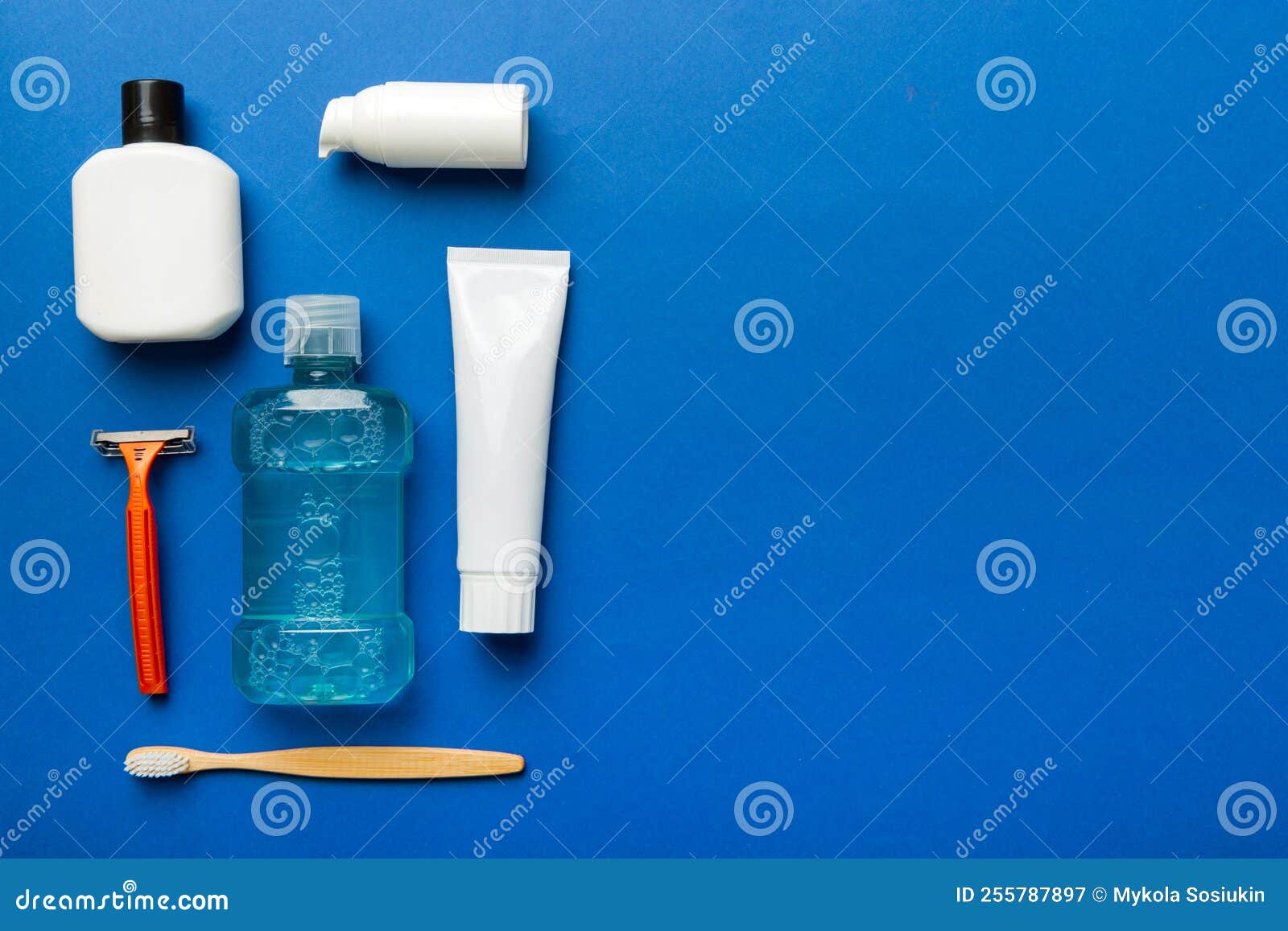 Composition with Bath Cosmetics on Table. Razor, Toothpaste, Soap, Gel ...