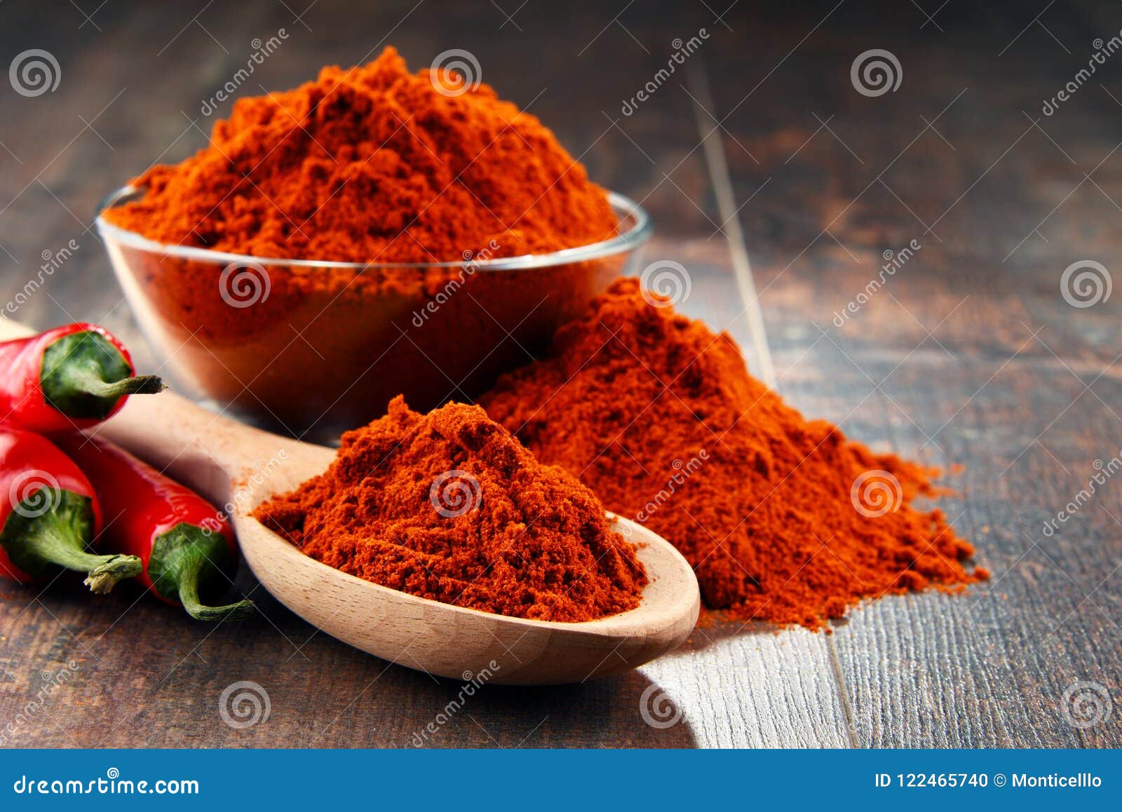 Composition with Bowl of Chili Powder on Wooden Table Stock Photo ...