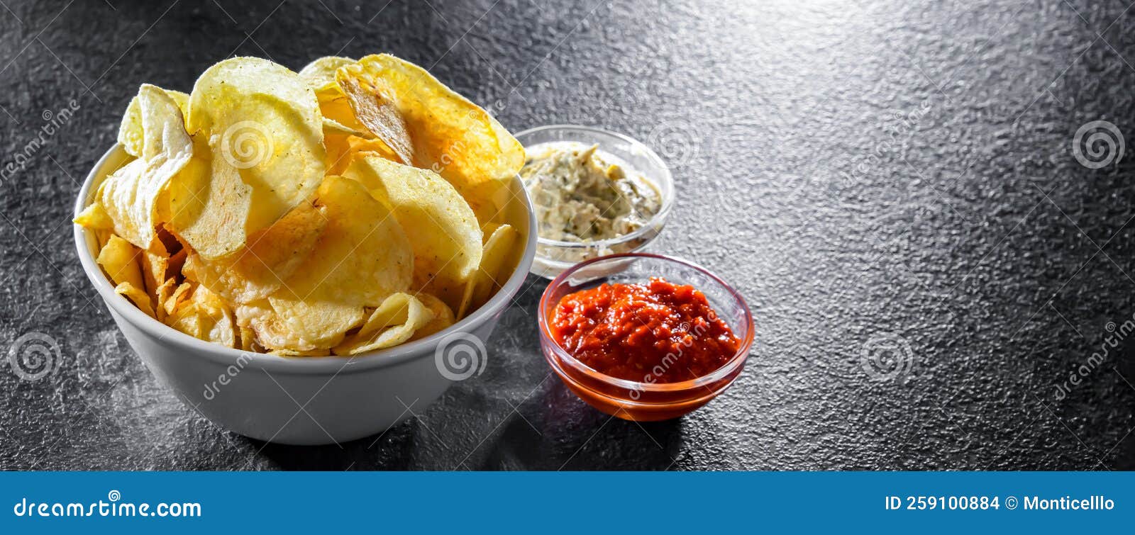 Composition with a Bowl of Potato Chips and Dipping Sauces Stock Photo ...