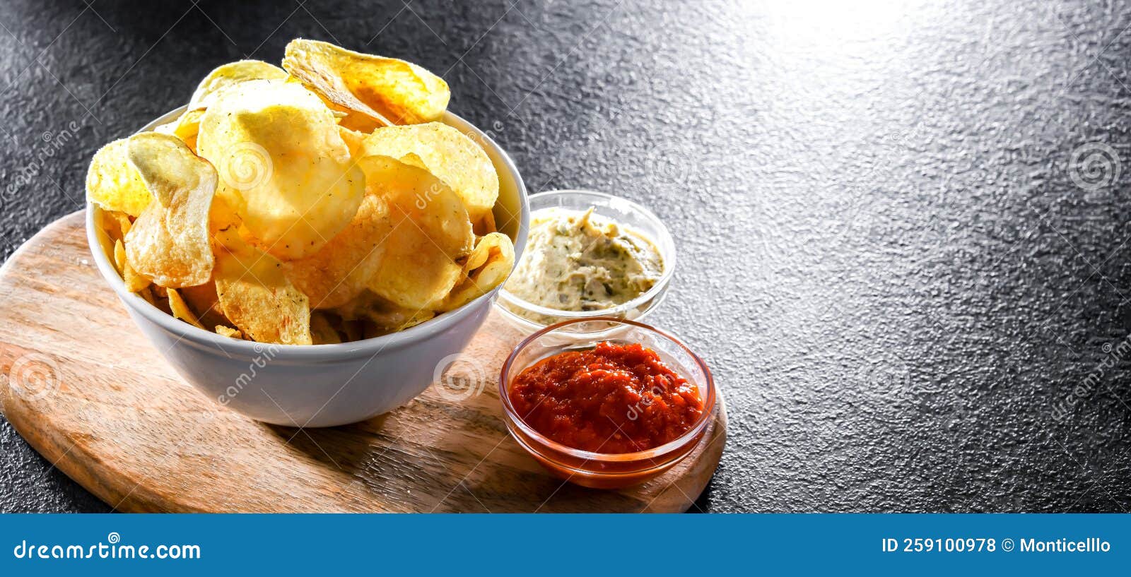 Composition with a Bowl of Potato Chips and Dipping Sauces Stock Photo ...
