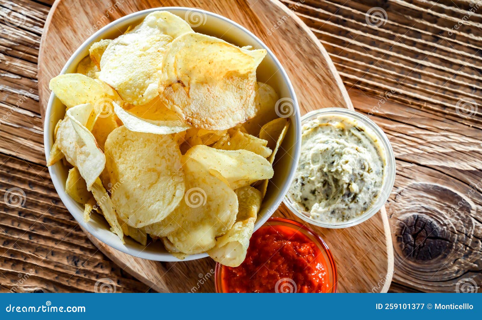 Composition with a Bowl of Potato Chips and Dipping Sauces Stock Image ...