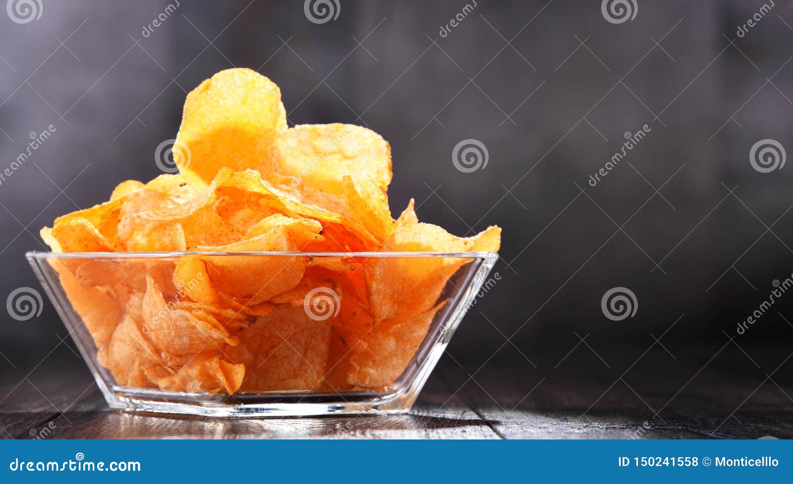 Composition with Bowl of Potato Chips Stock Photo - Image of crisps ...