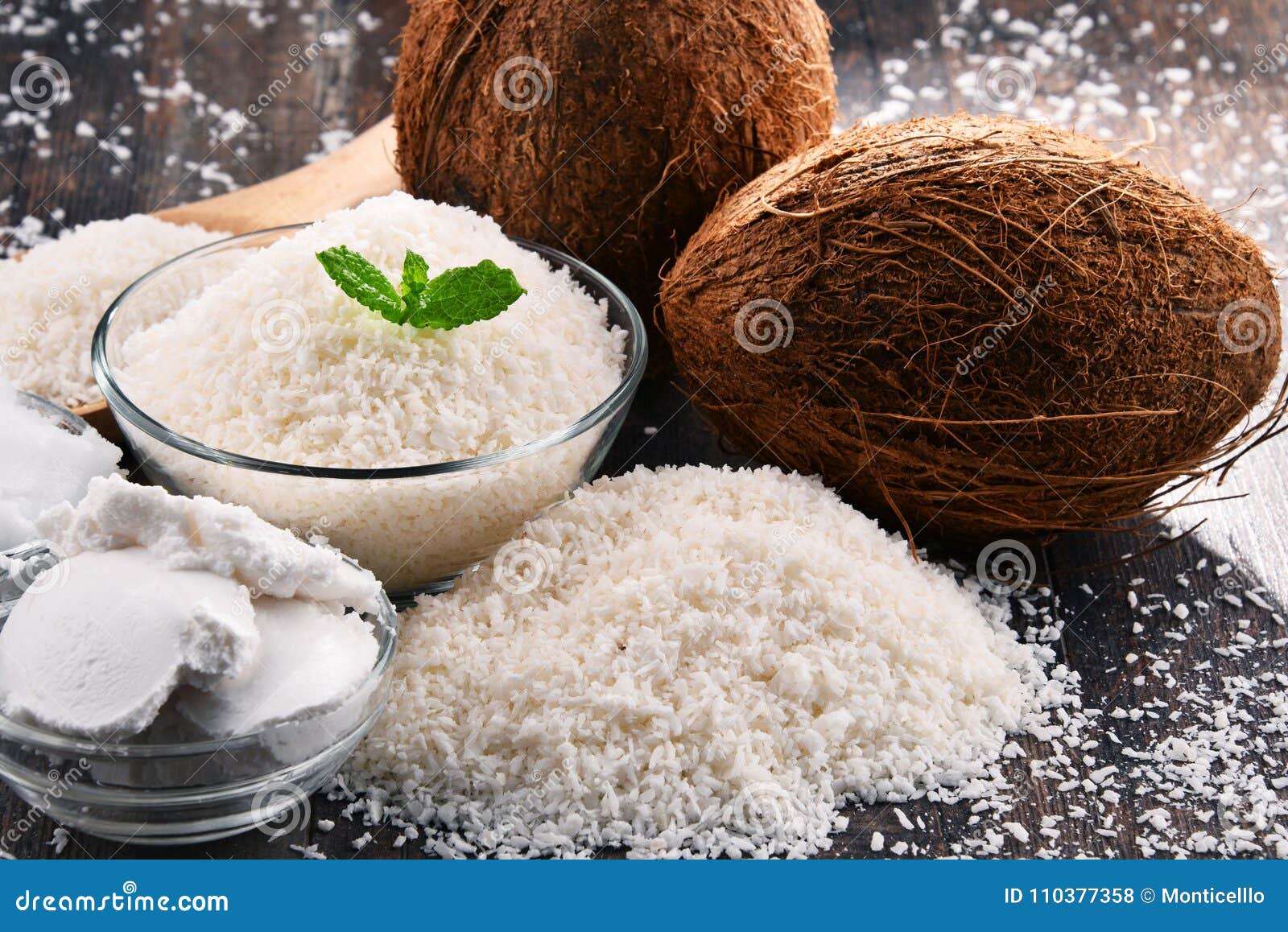 Composition with Bowl of Shredded Coconut and Shells Stock Photo ...