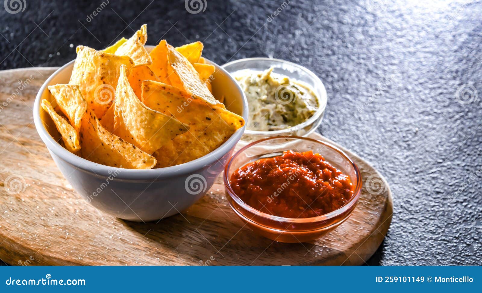 Composition with a Bowl of Tortilla Chips and Dipping Sauces Stock ...