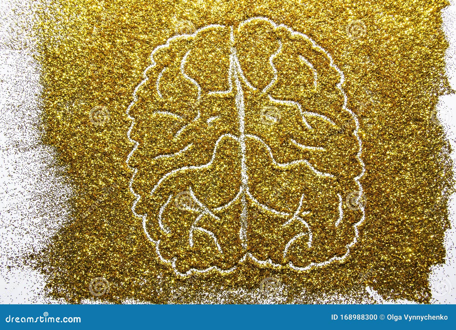 A Composition with Brain on Beautiful Gold Glitter. Background and ...