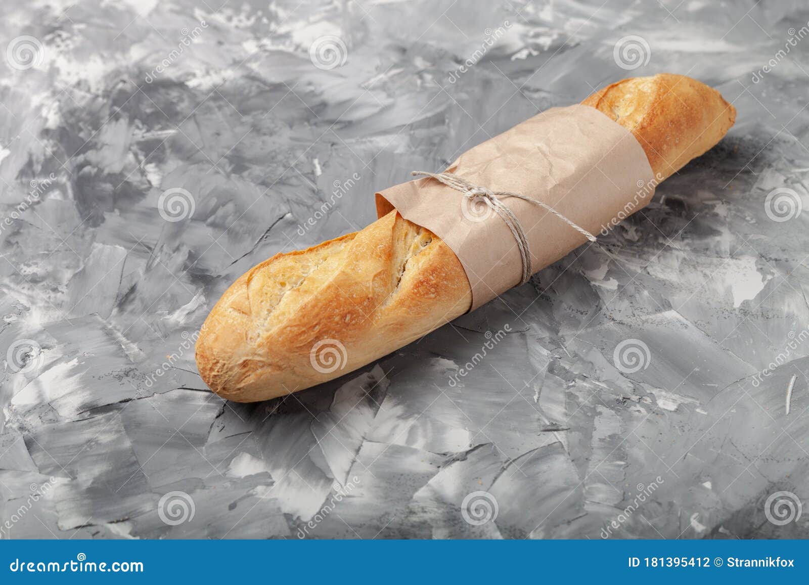 Composition with a Bread on a Textured Plastered Surface. Stock Photo ...