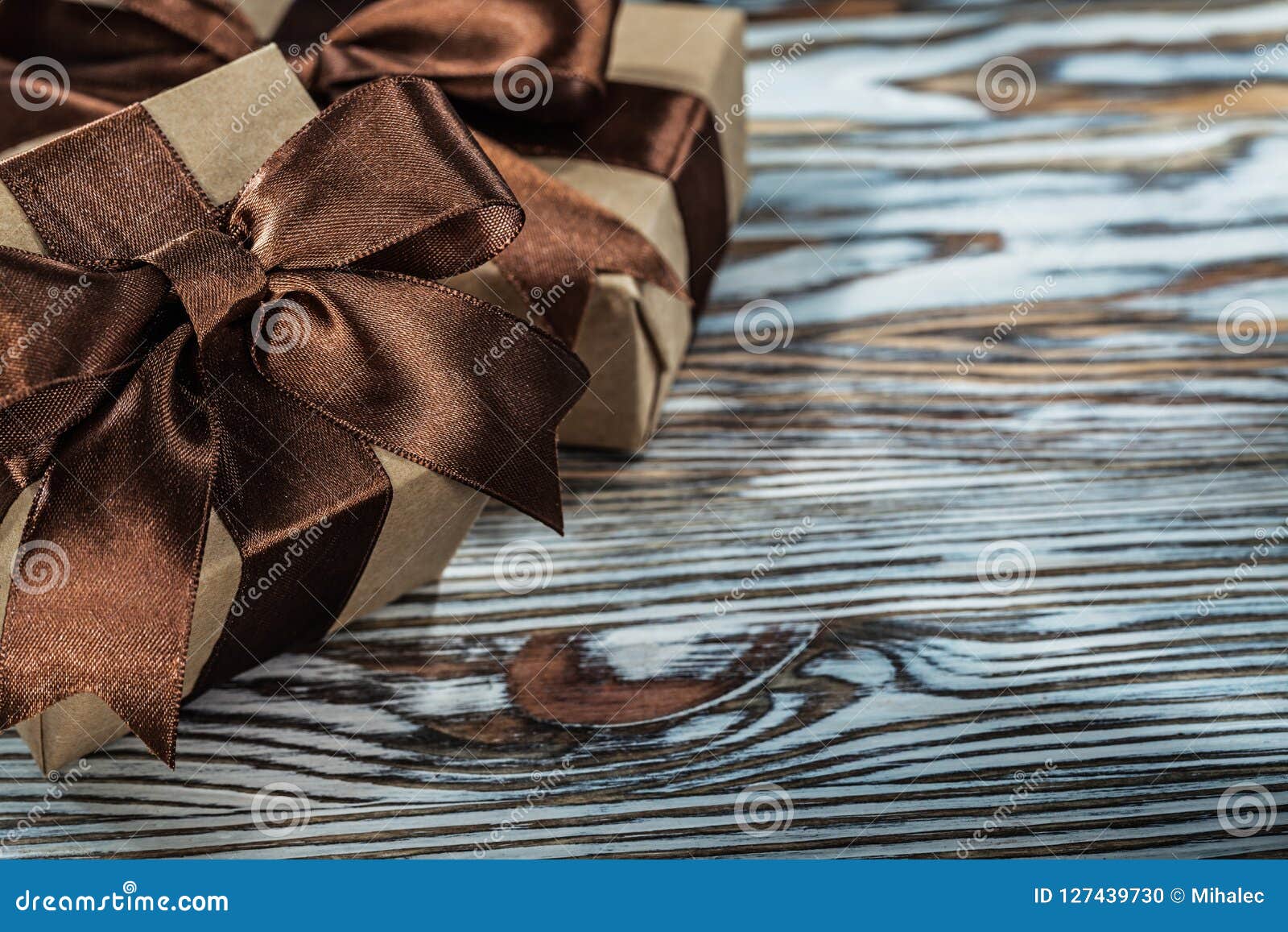 Composition of Brown Present Boxes on Wooden Background Stock Photo ...
