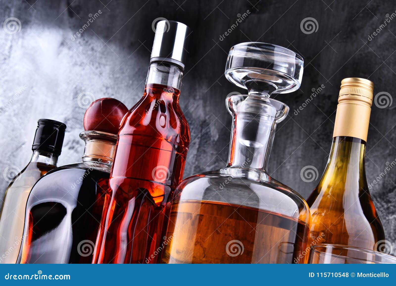 Carafe and Bottles of Assorted Alcoholic Beverages. Stock Photo - Image ...