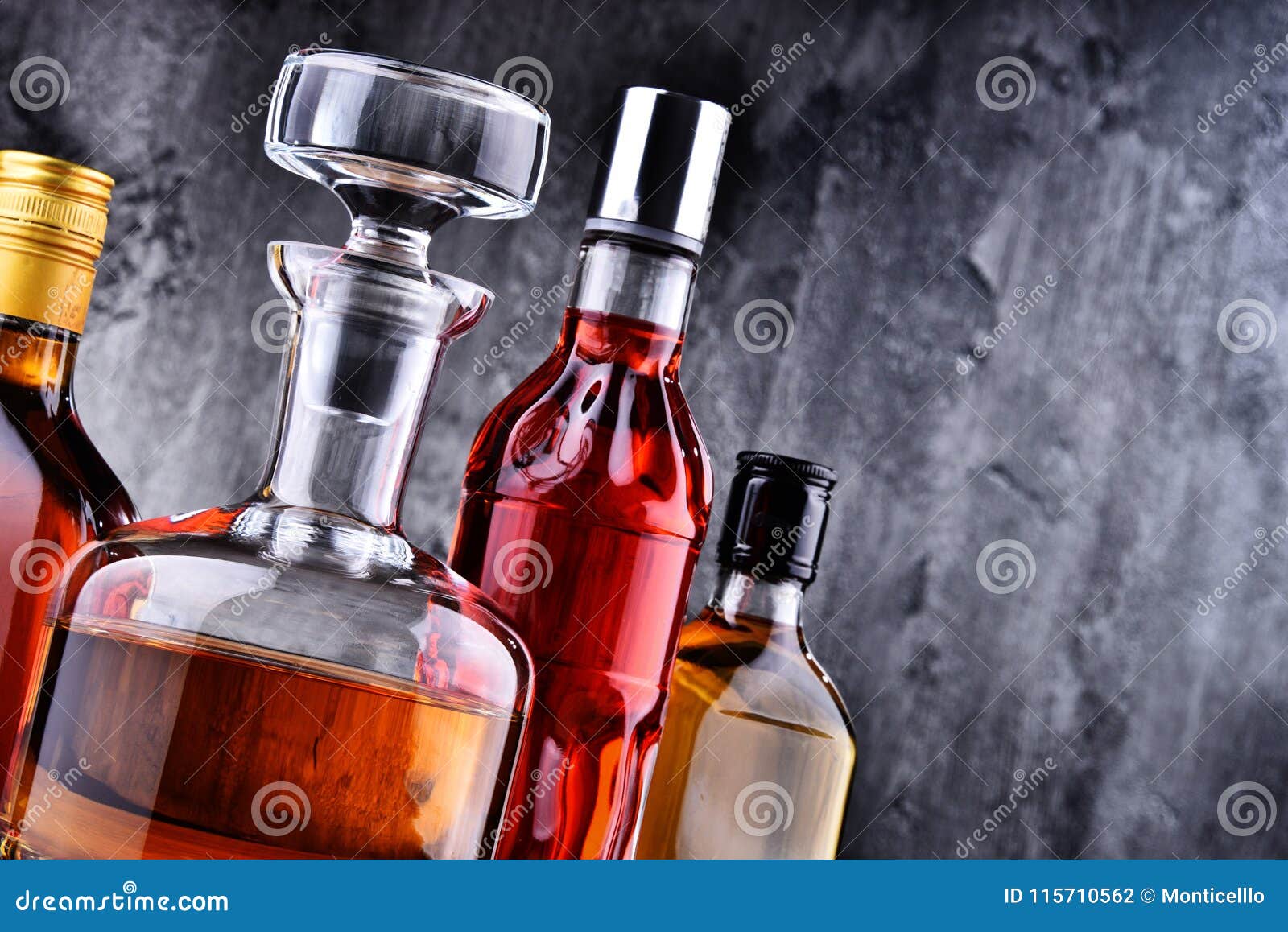 Carafe and Bottles of Assorted Alcoholic Beverages. Stock Photo - Image ...