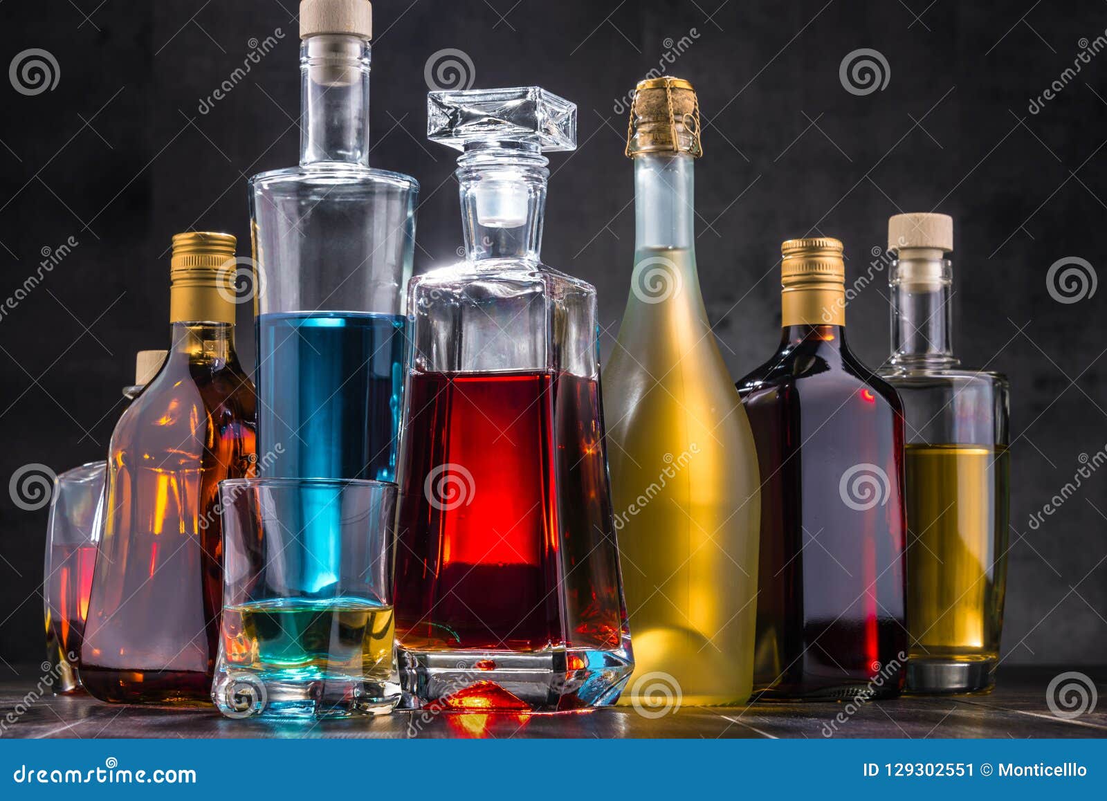 Carafe and Bottles of Assorted Alcoholic Beverages. Stock Image - Image ...