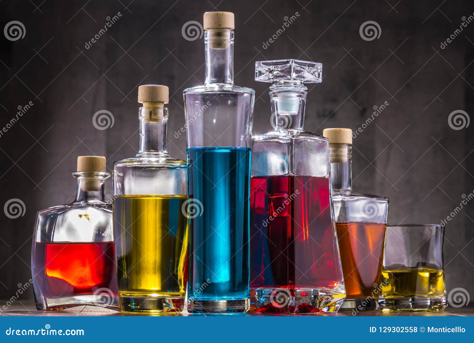 Carafe and Bottles of Assorted Alcoholic Beverages. Stock Photo - Image ...