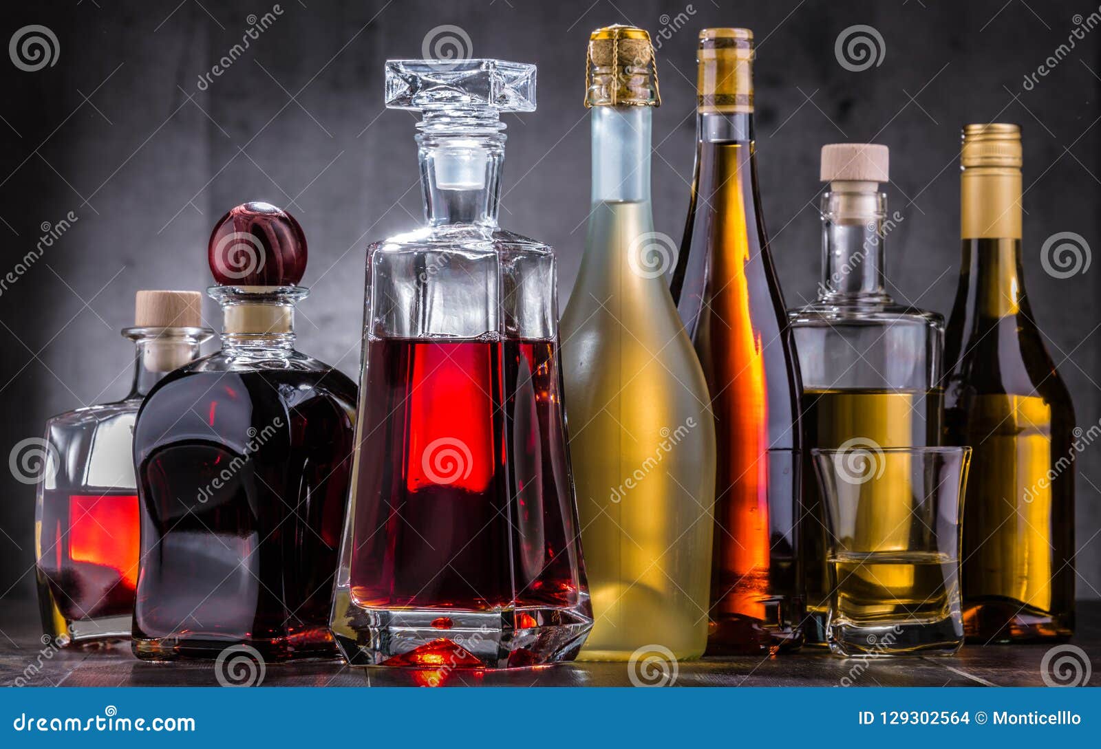 Carafe and Bottles of Assorted Alcoholic Beverages. Stock Photo - Image ...