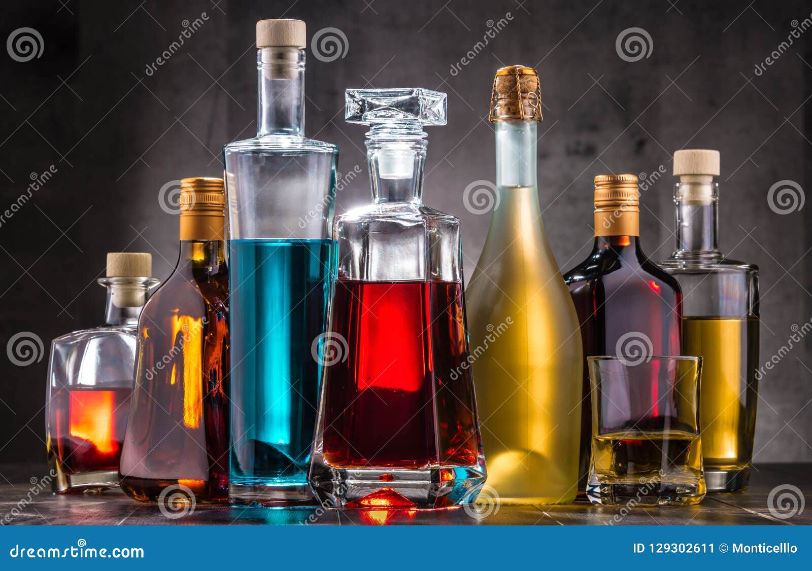 Carafe and Bottles of Assorted Alcoholic Beverages. Stock Image - Image ...