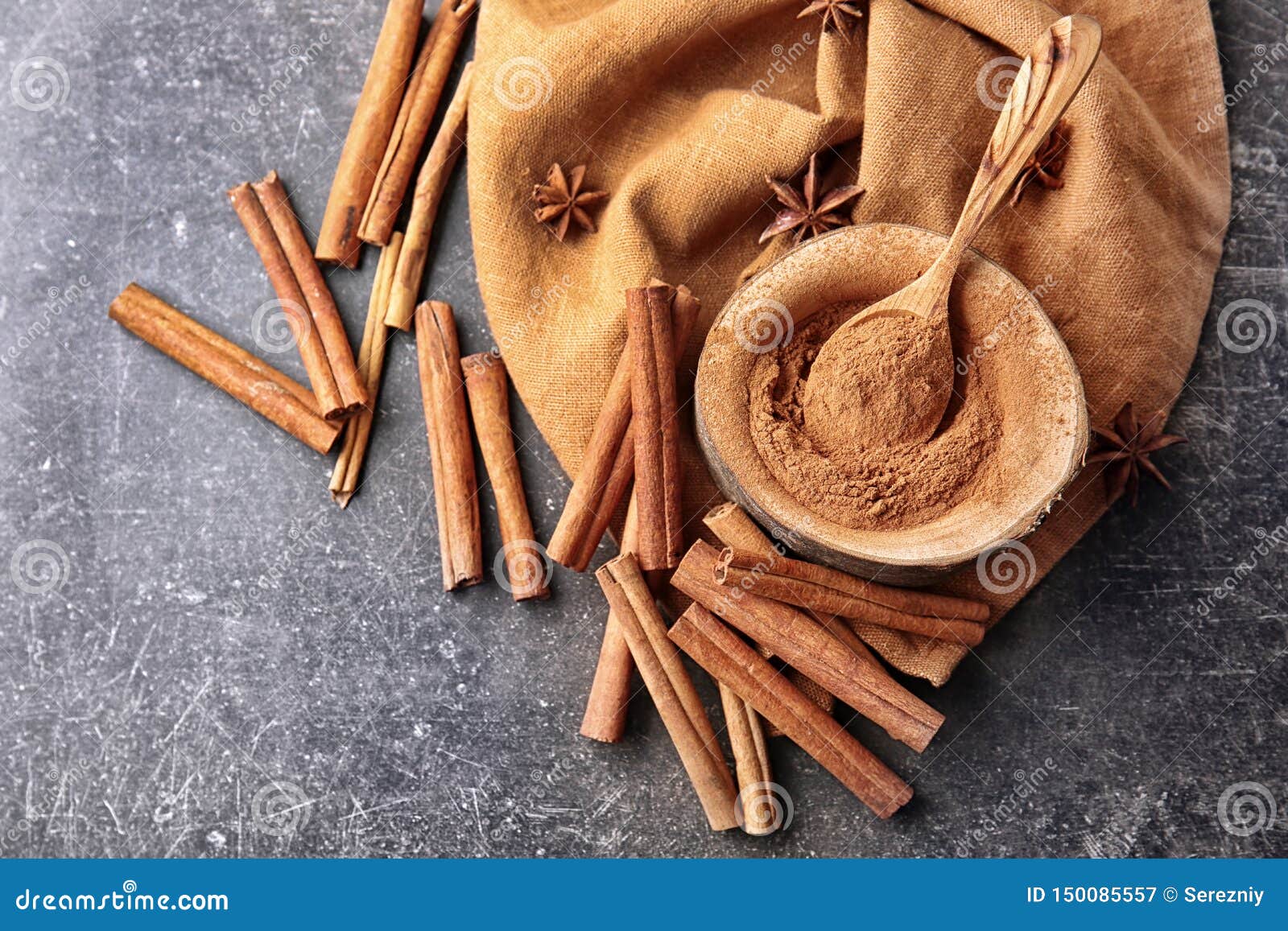 Composition with Cinnamon Powder and Sticks on Grey Background Stock ...
