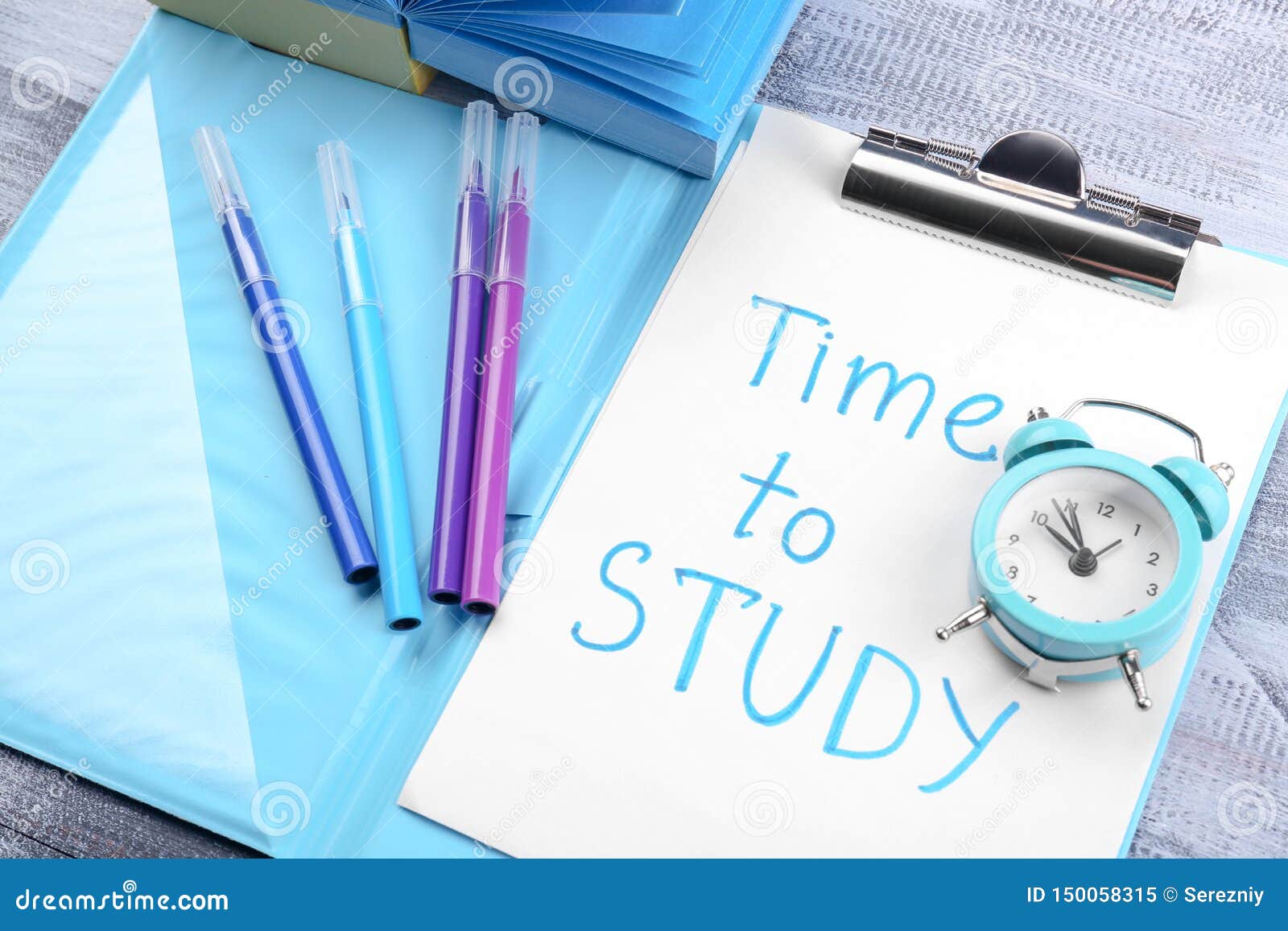 Composition with Clipboard and Inscription "Time To Study " on Table ...