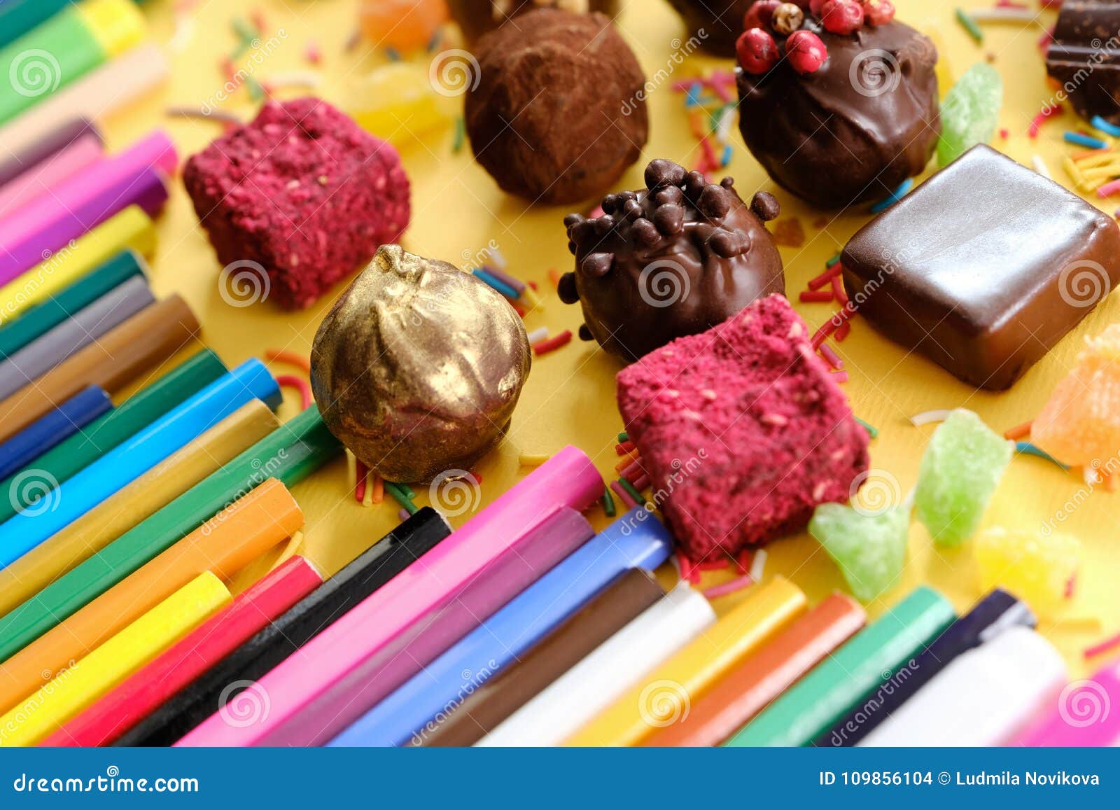 Composition of Colored Pencils and Beautiful Sweets Stock Photo - Image ...
