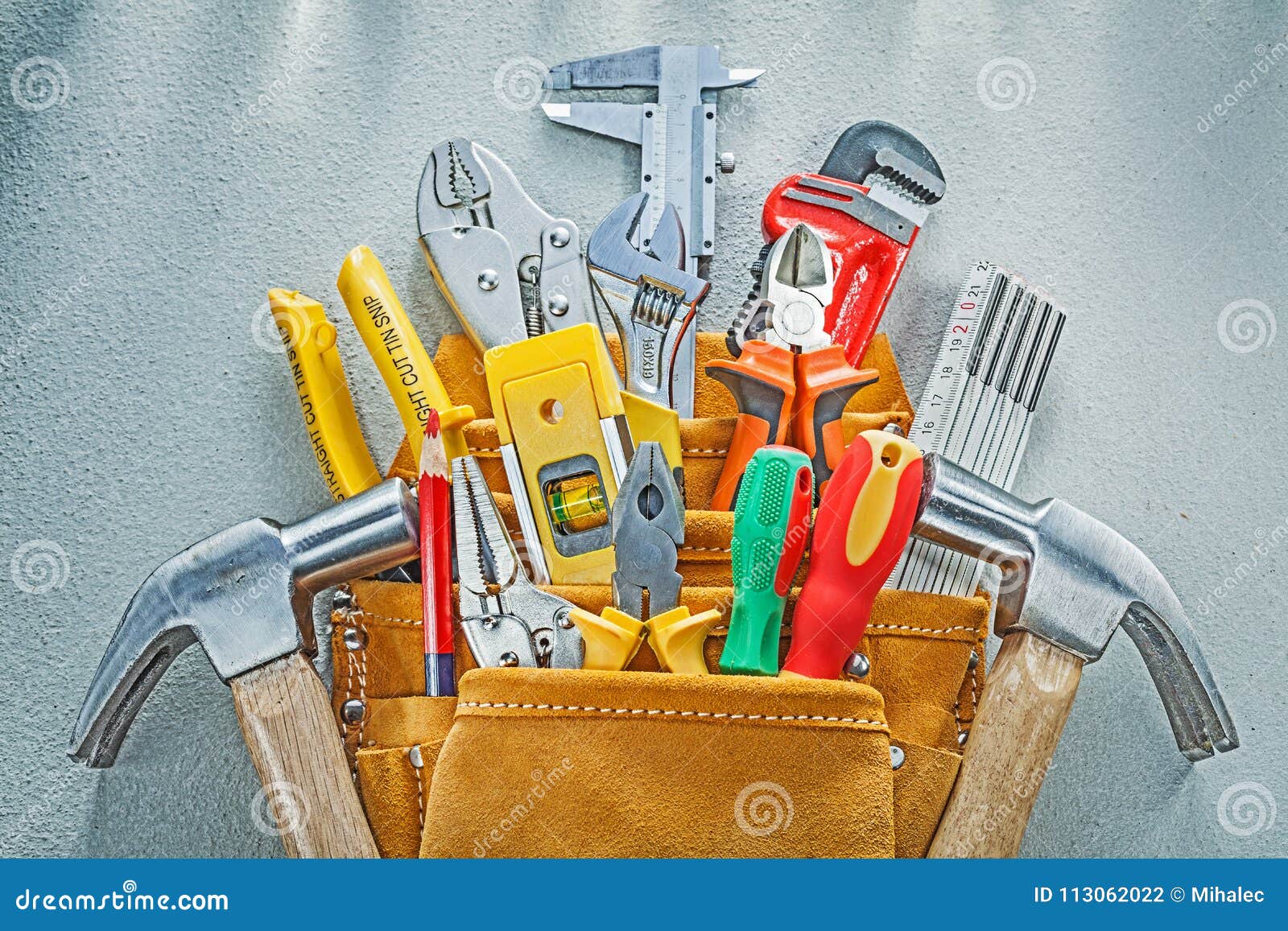 Composition of Construction Tooling in Tool Belt on Concrete Bac Stock ...