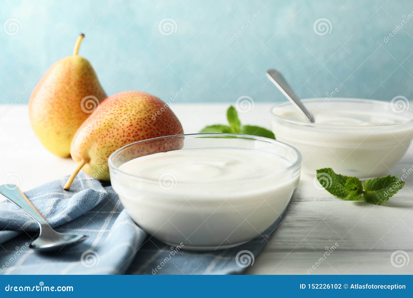 Composition with Cream Yogurts and Fruits on White Table Stock Photo ...
