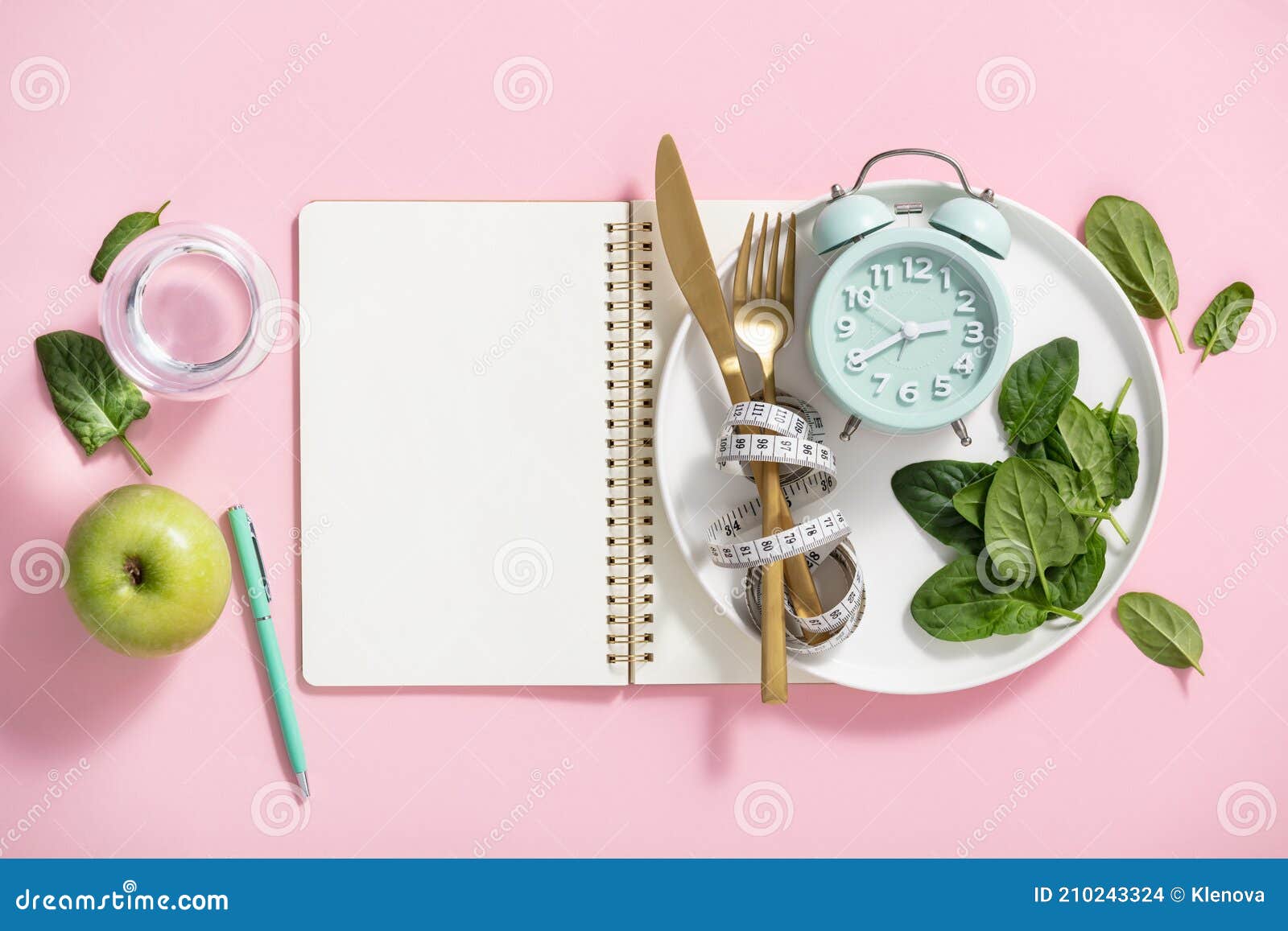 Composition with Cutlery, Measuring Tape, Blank Paper Notebook, Spinach ... Composition with Cutlery, Measuring Tape, Blank Paper Notebook, Spinach ...