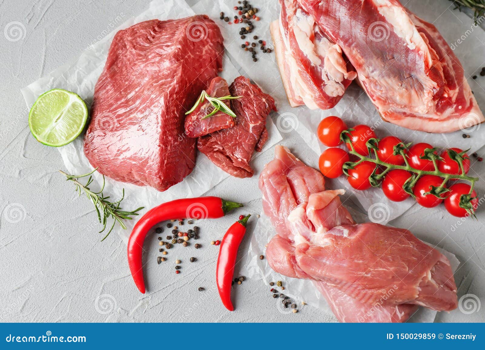 Composition with Different Sorts of Fresh Meat on Grey Background Stock ...