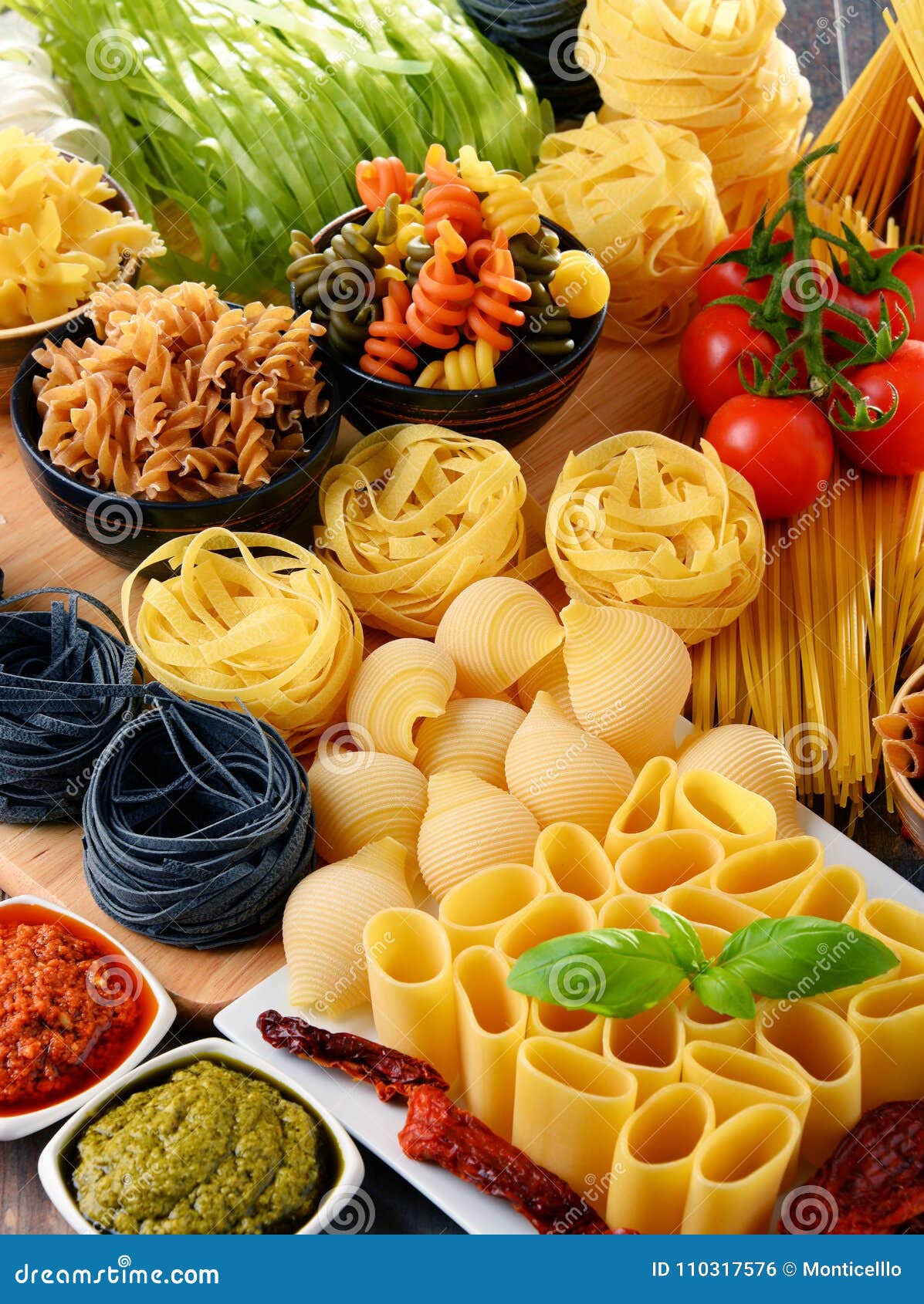 Composition with Different Sorts of Pasta on Kitchen Table Stock Photo ...