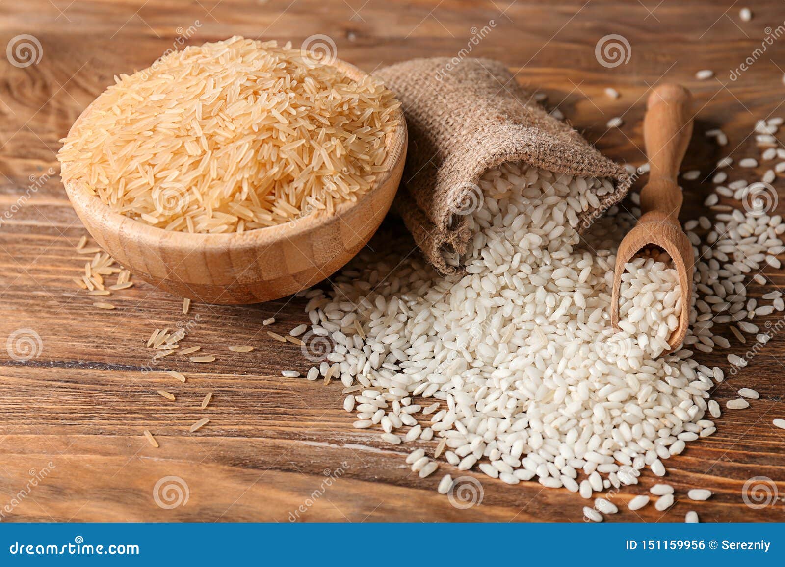 Composition with Different Types of Rice on Wooden Background Stock ...
