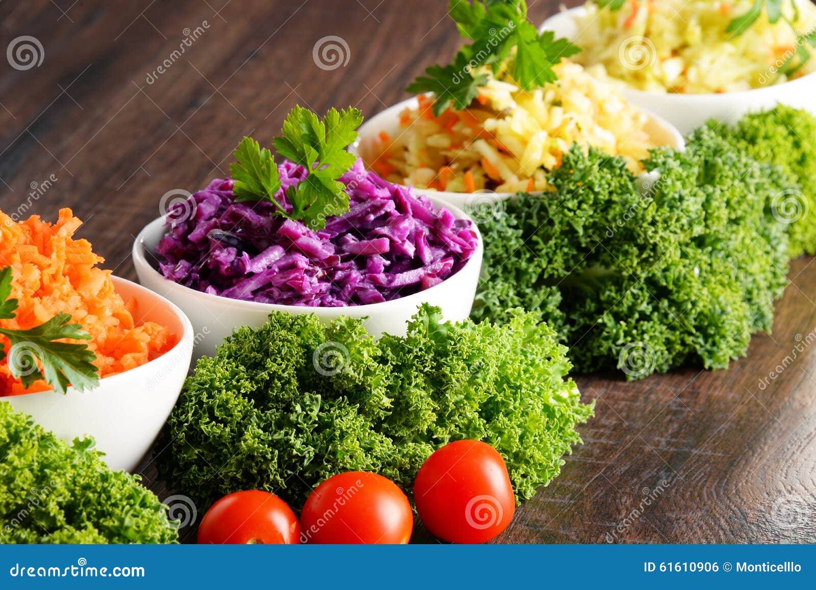 Composition with Four Vegetable Salad Bowls on Wooden Table Stock Photo ...