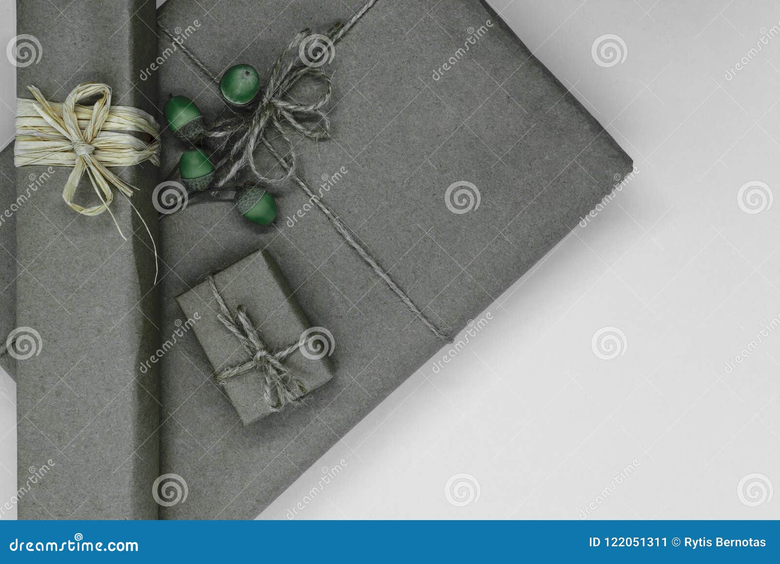 Composition of Grey Gift Boxes Wrapped in Paper and Bundled with ...