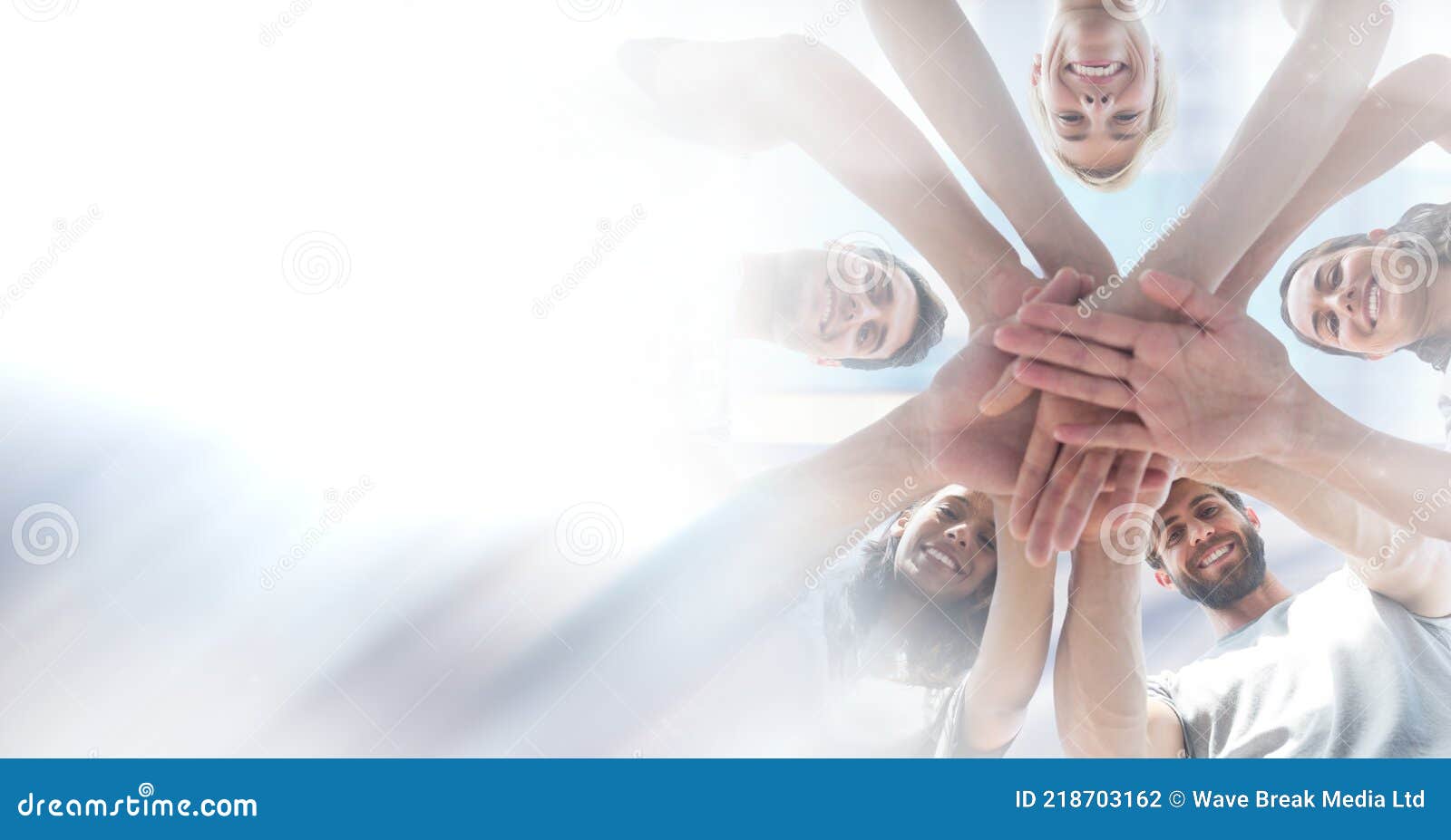 Composition of Light Background Over Group of Young Businesspeople ...