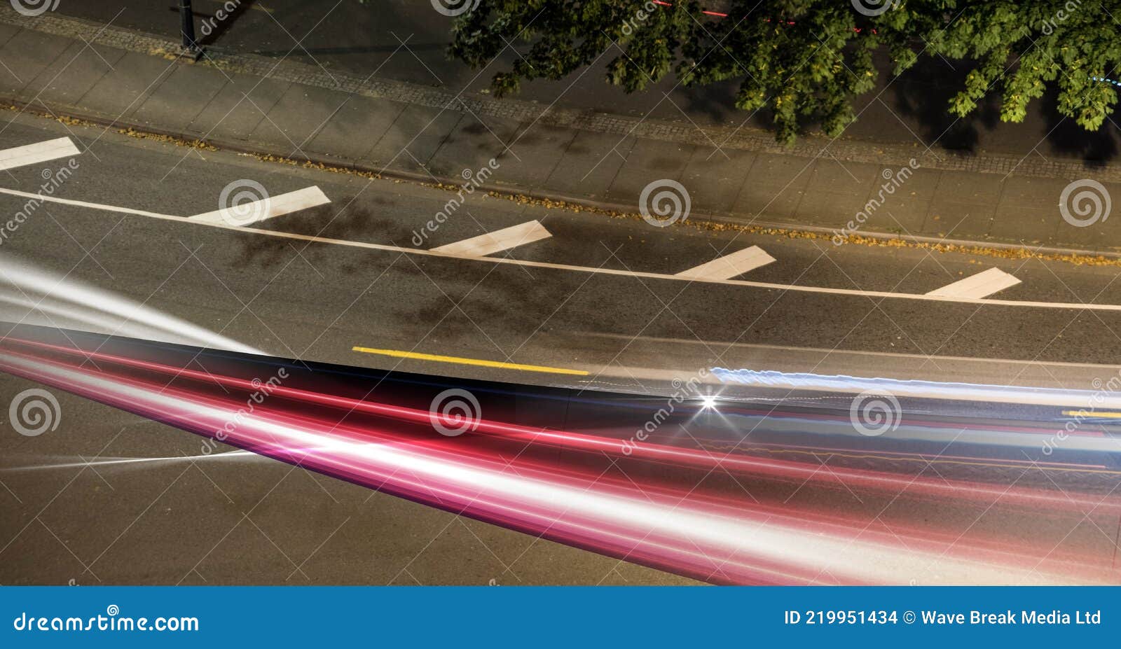 Composition of Network of Pink Light Trails and Connections Over Road ...