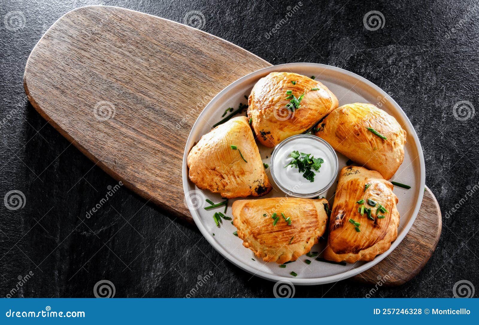 Composition with a Plate of Oven-baked Pierogi Stock Photo - Image of ...