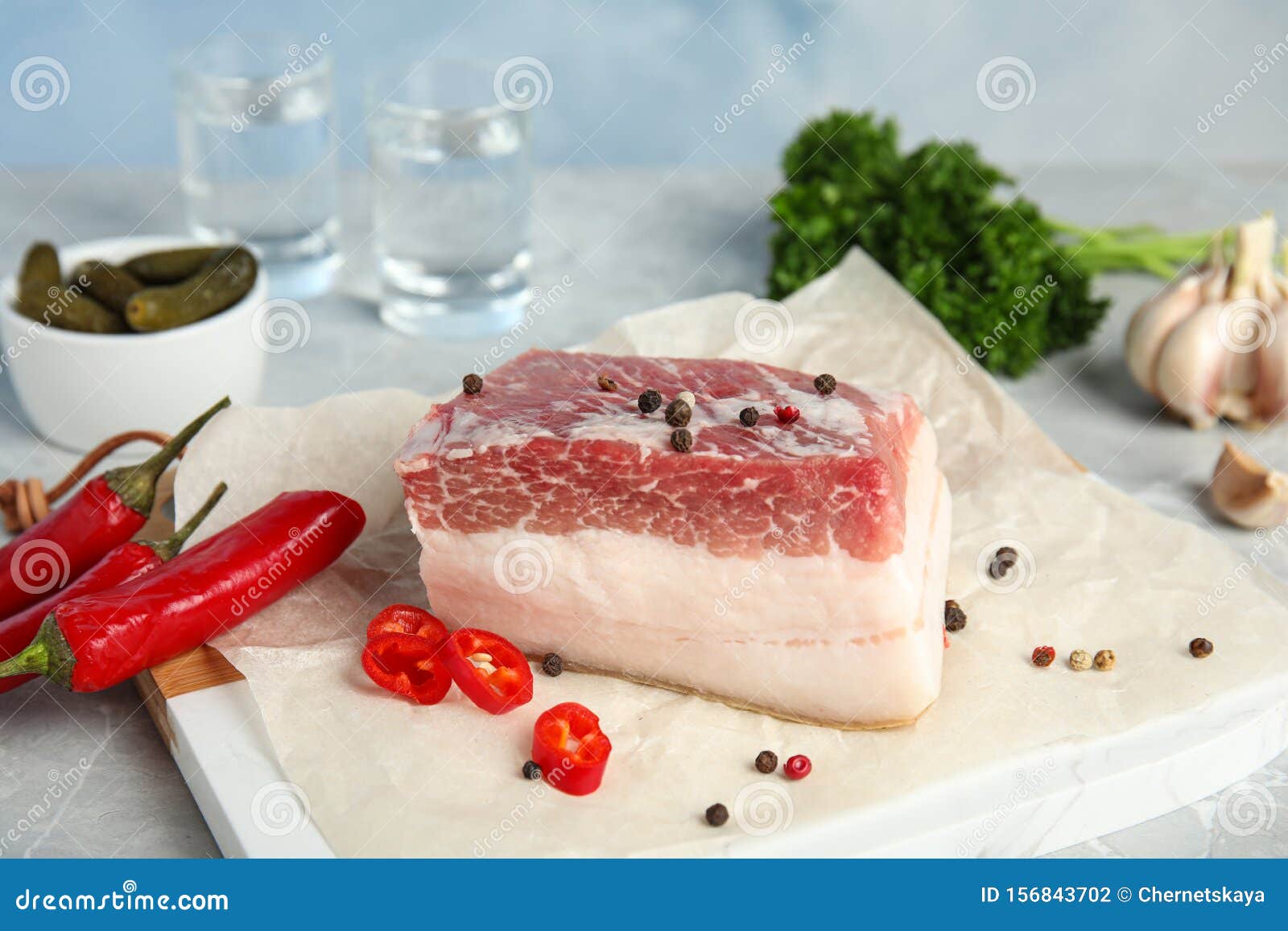 Composition with Pork Fatback and Spices on White Table Stock Photo ...