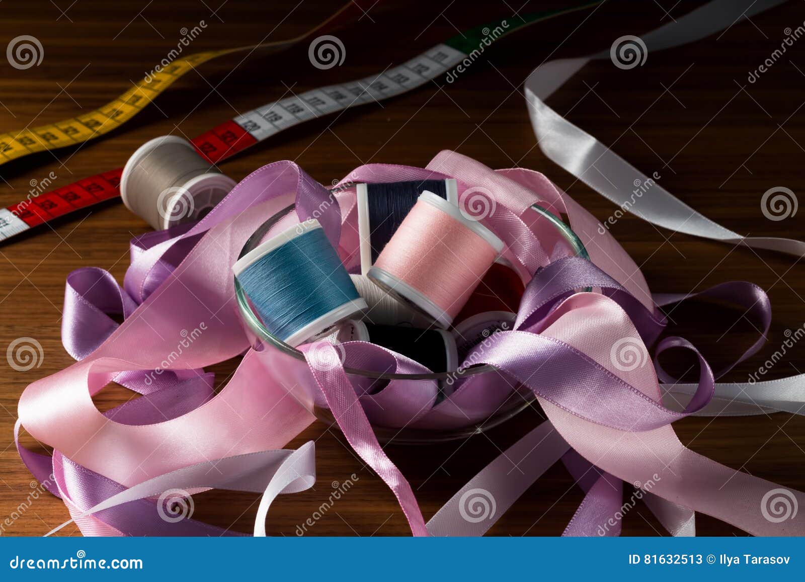 Composition of Ribbons and Thread on a Wooden Table. Stock Image ...