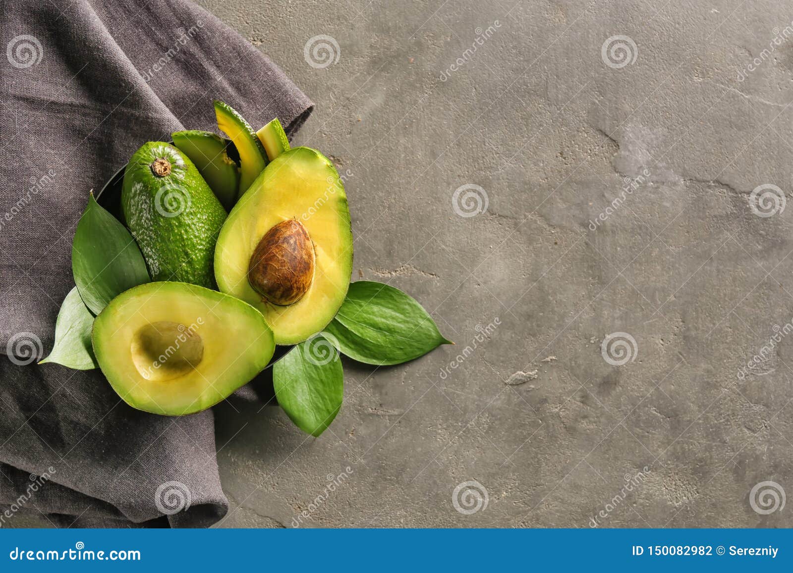 Composition with Ripe Avocados on Dark Grey Background Stock Photo ...