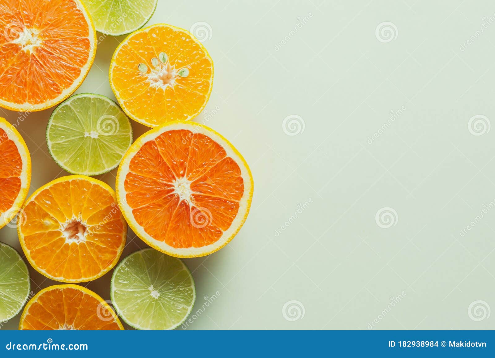 Composition with Slices of Citrus on Color Background Stock Photo ...