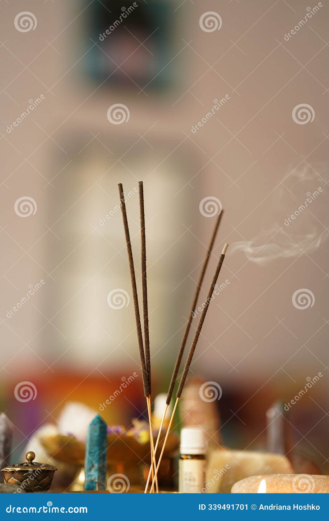 Composition with Smoldering Incense Sticks and Spa Stones on ...