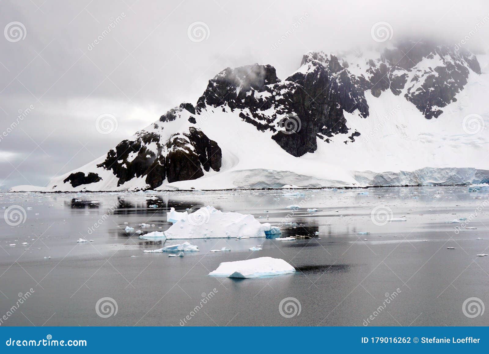 A Composition of Snow, Ice, Clouds and Mountains, Antarctica Stock ...