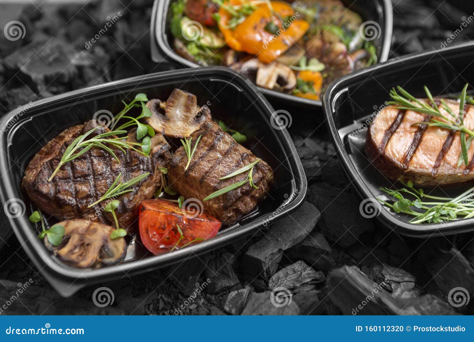 Composition of Three Grilled Dishes in To Go Boxes Stock Photo - Image ...