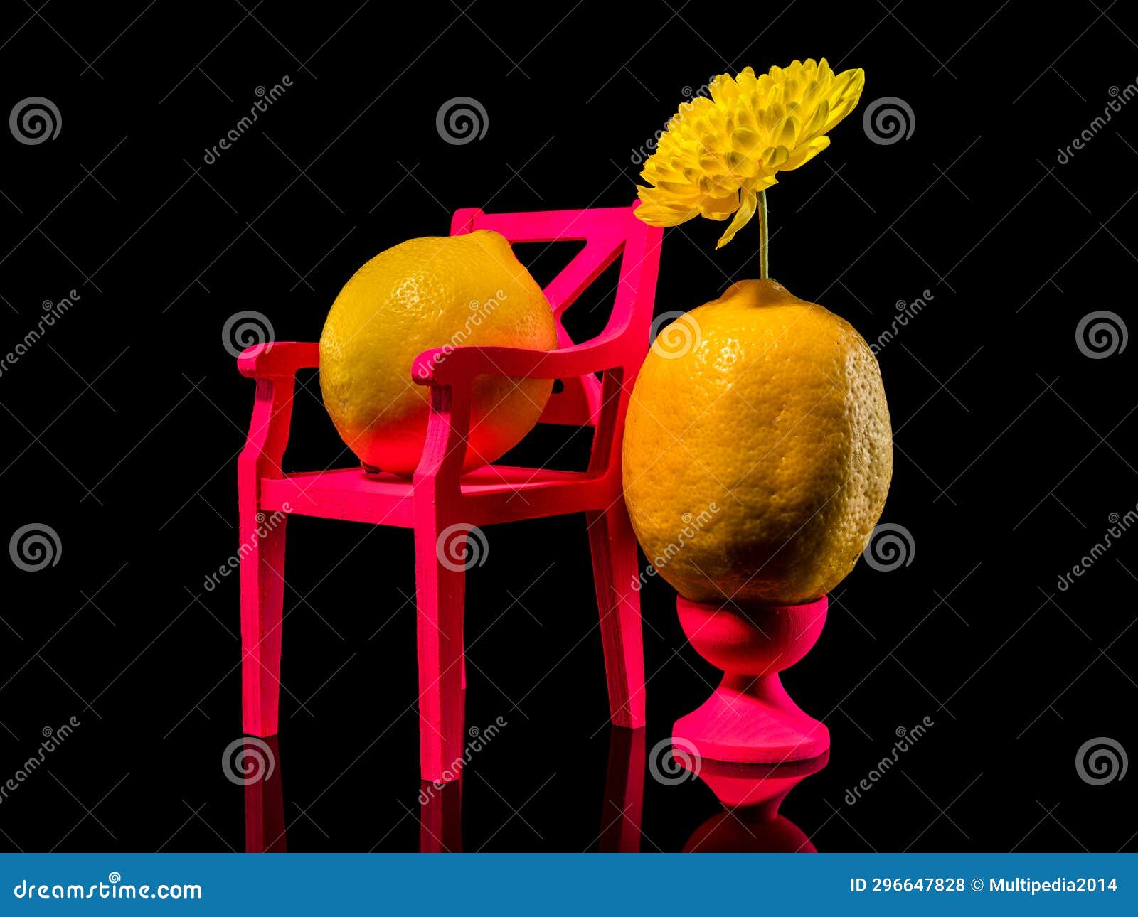 Composition with Two Lemons and Chair on a Black Background Stock Photo ...